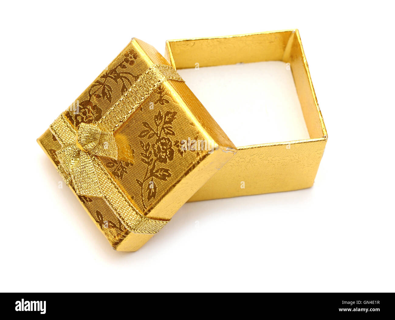 open golden gift boxes with golden ribbon Stock Photo - Alamy