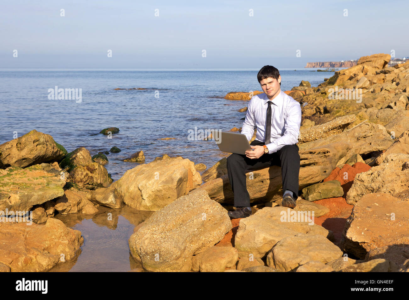 Man with laptop Stock Photo - Alamy
