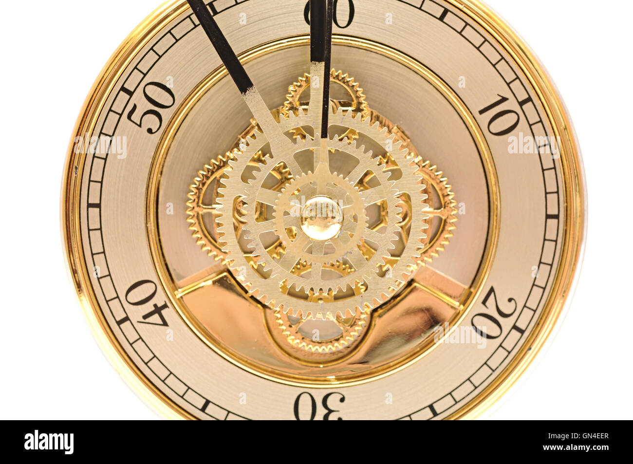closeup golden clock with gears Stock Photo - Alamy