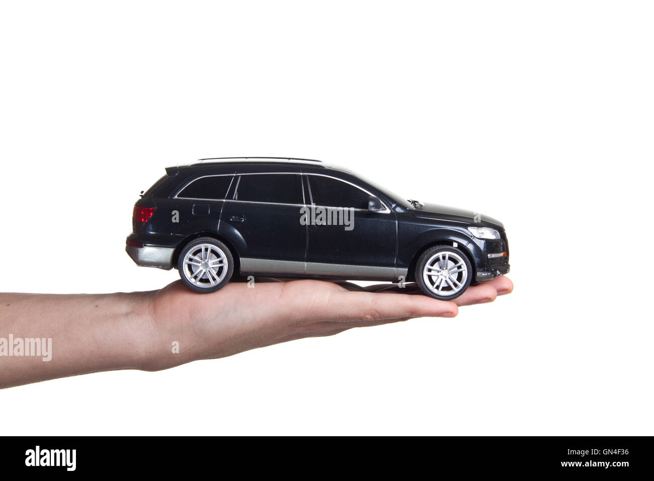 man holding a toy car Stock Photo - Alamy