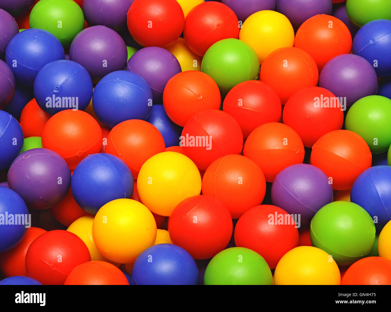 Purple plastic balls background hi-res stock photography and images - Alamy