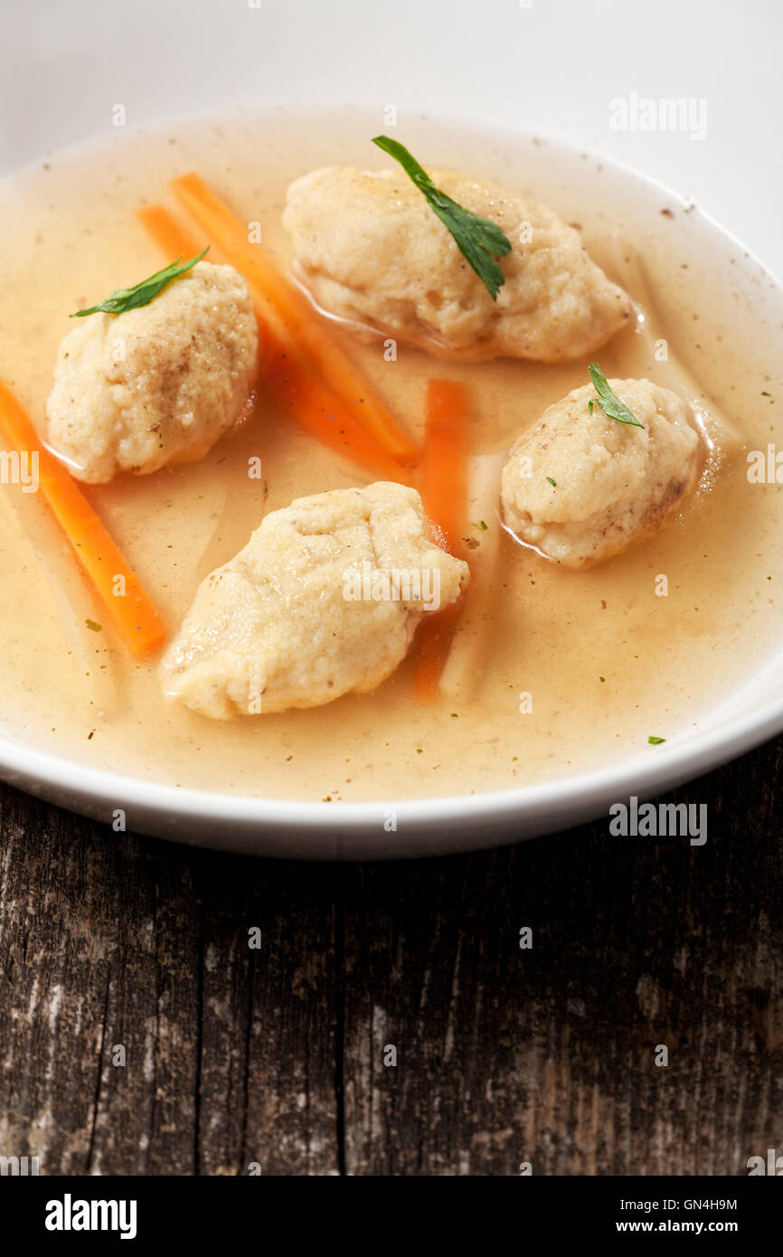 bavarian semolina dumpling soup with carrot Stock Photo - Alamy