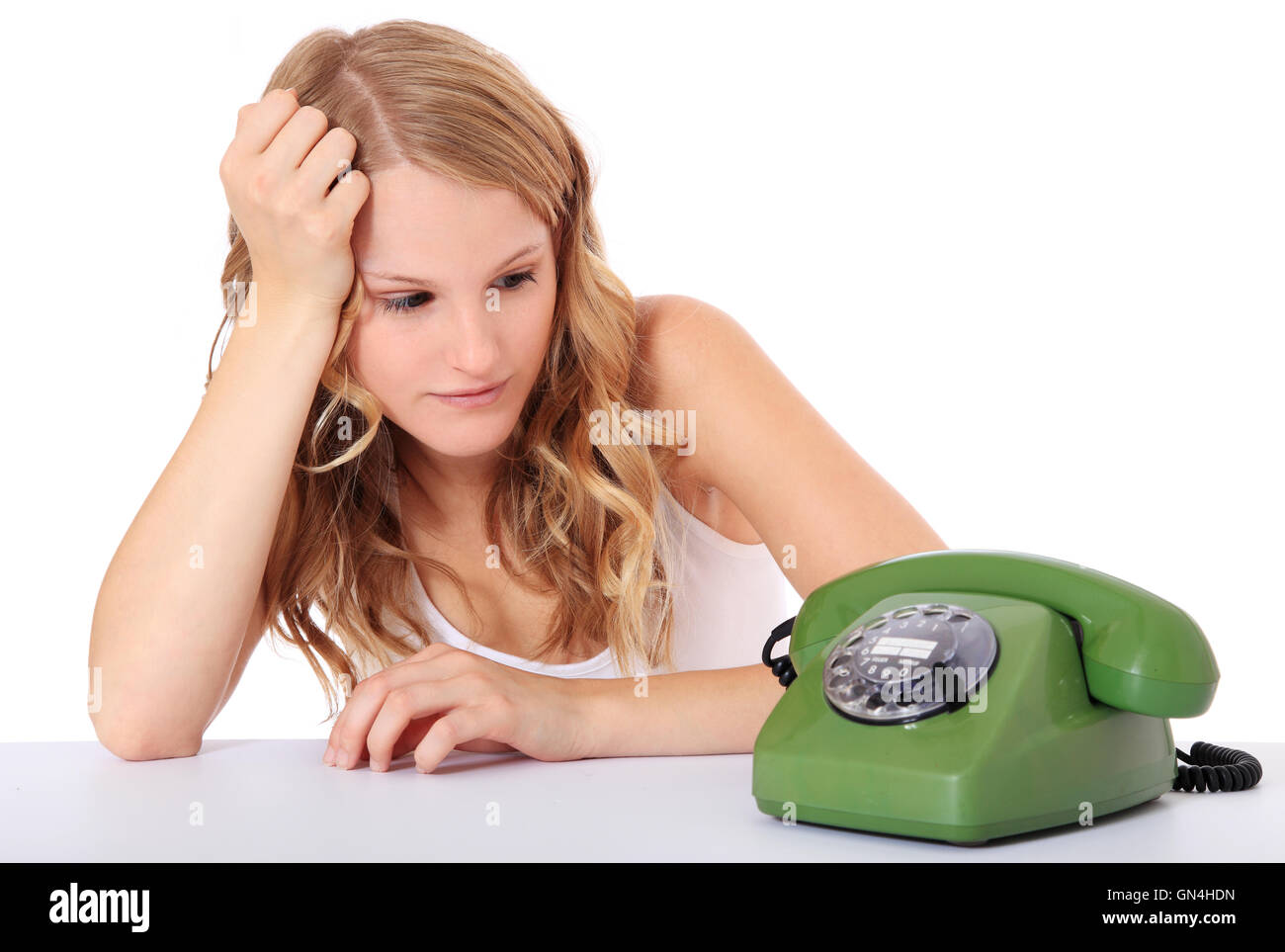 Awaiting a phone call Stock Photo - Alamy