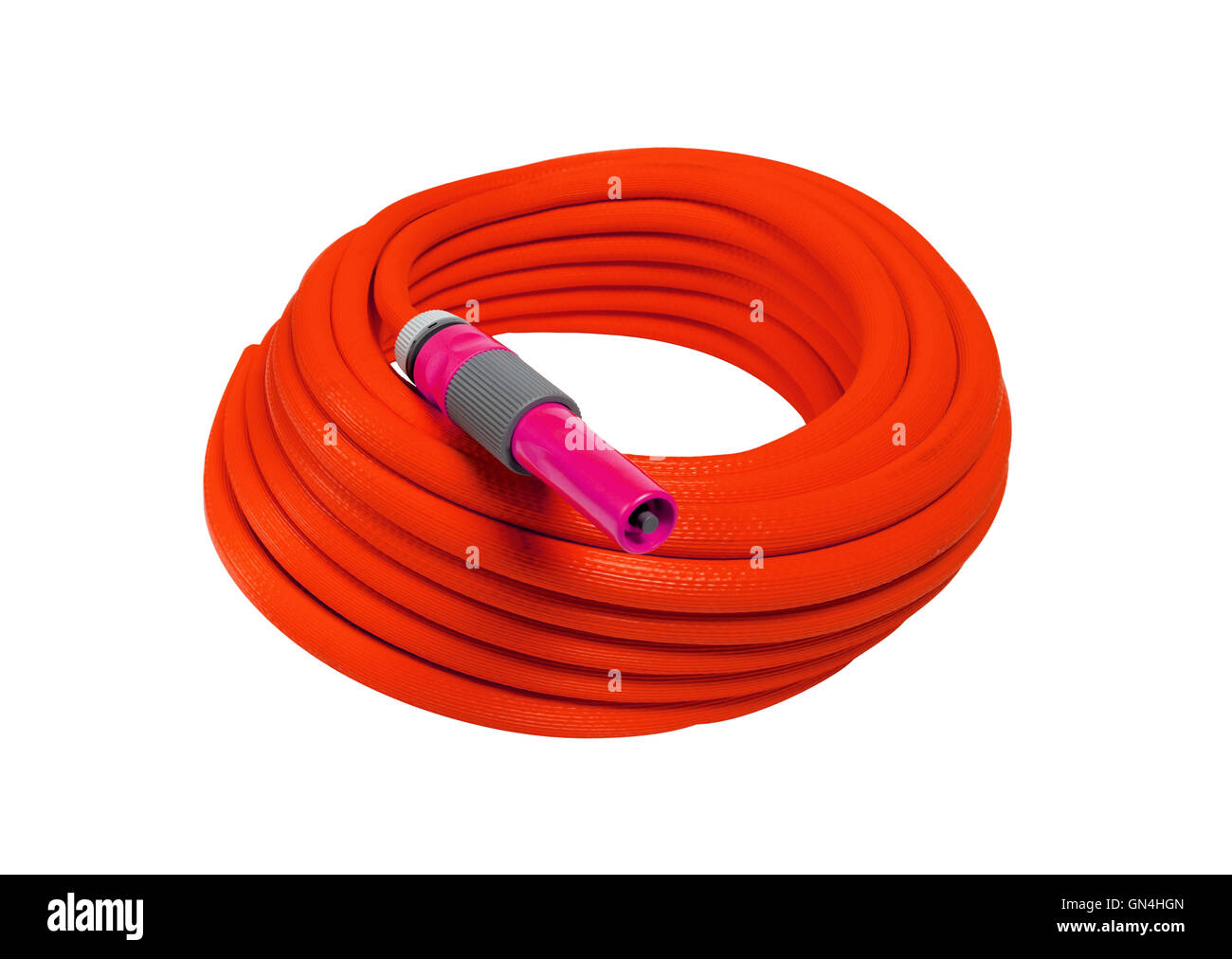red garden hose with nozzle Stock Photo - Alamy