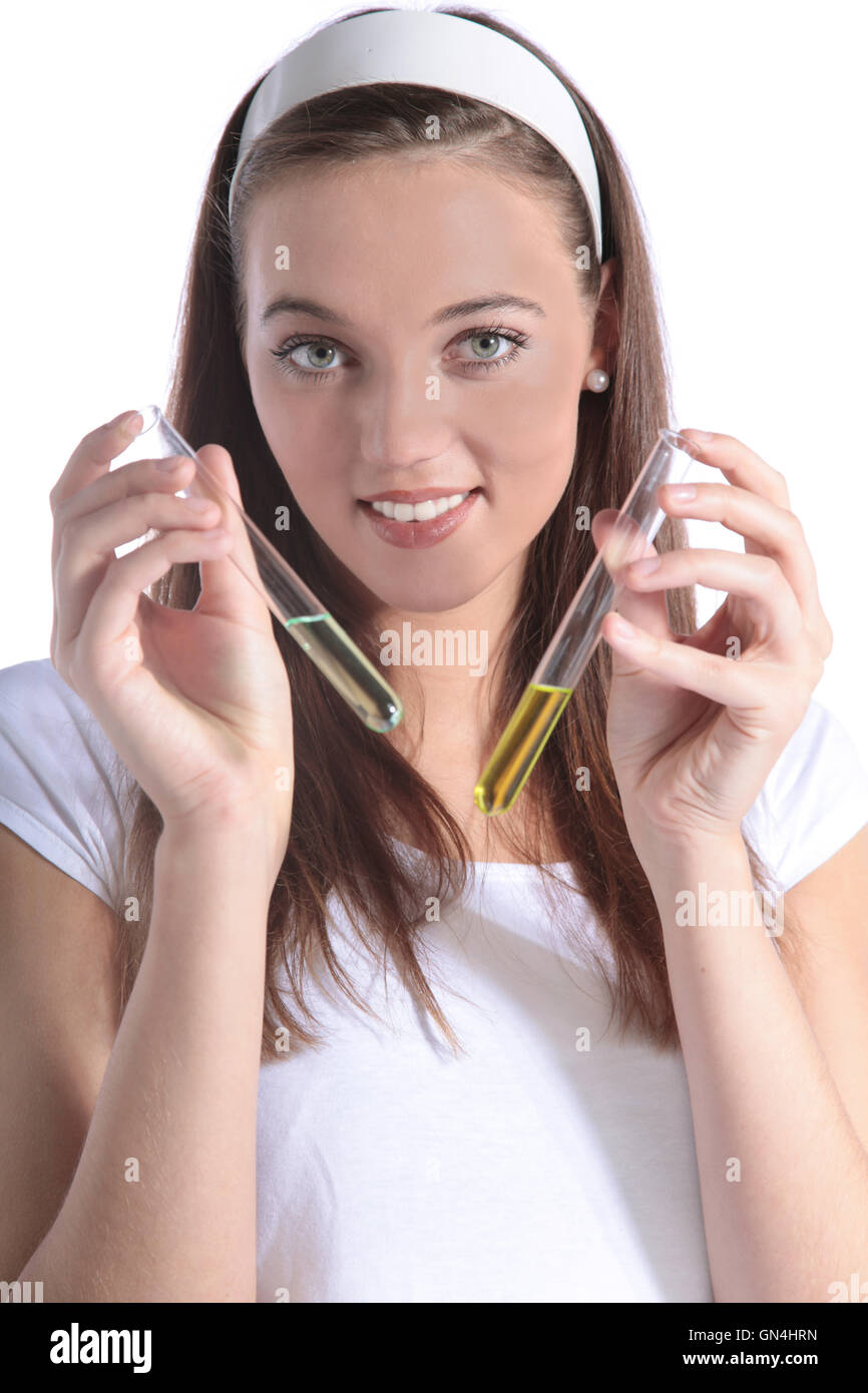 Chemistry student holding test tubes Stock Photo - Alamy