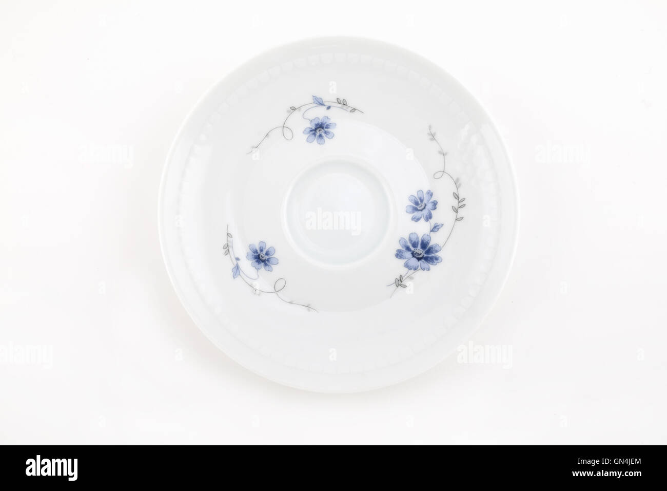 Ornamented plate on white Stock Photo - Alamy