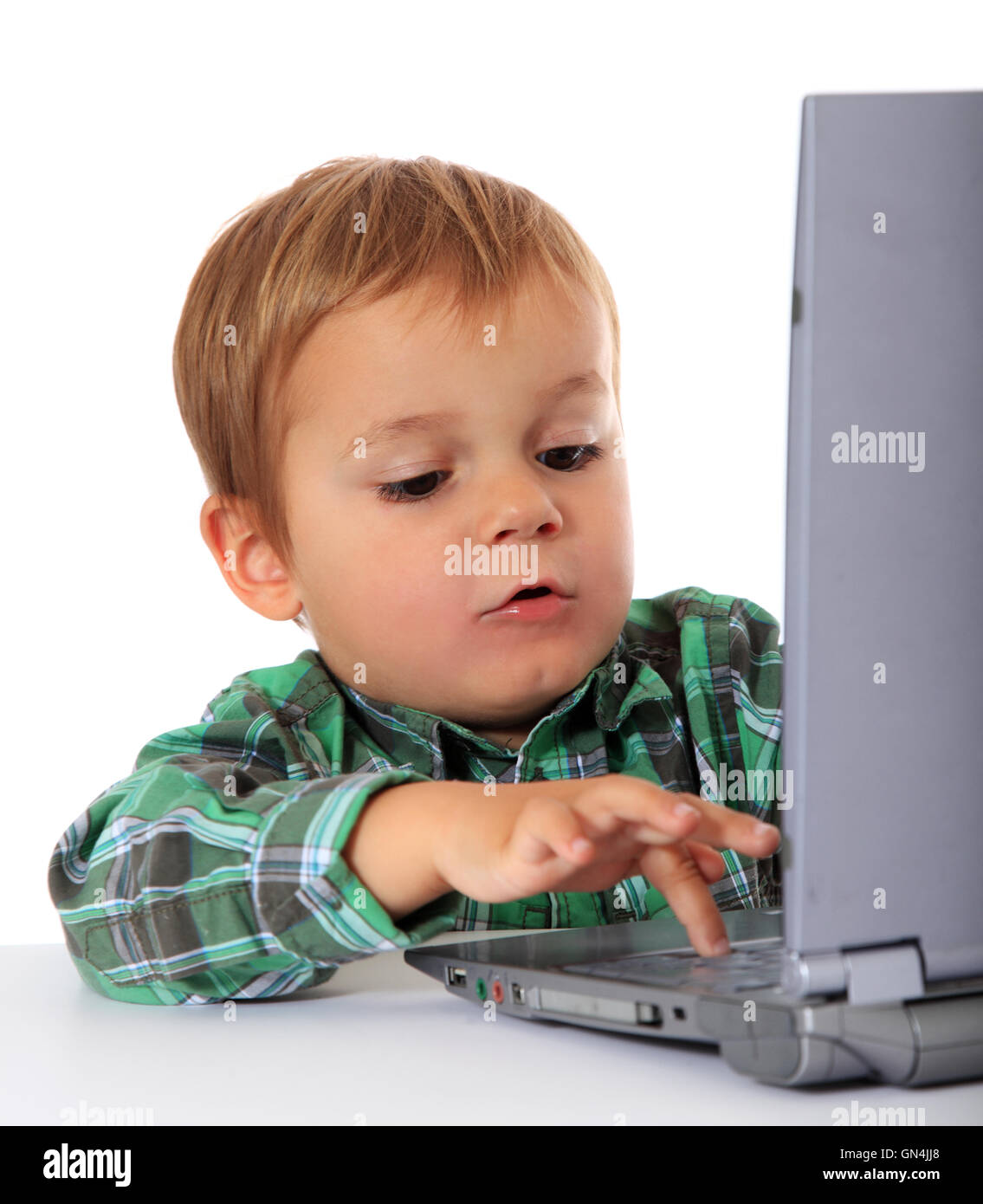 Boy with computer Stock Photo - Alamy