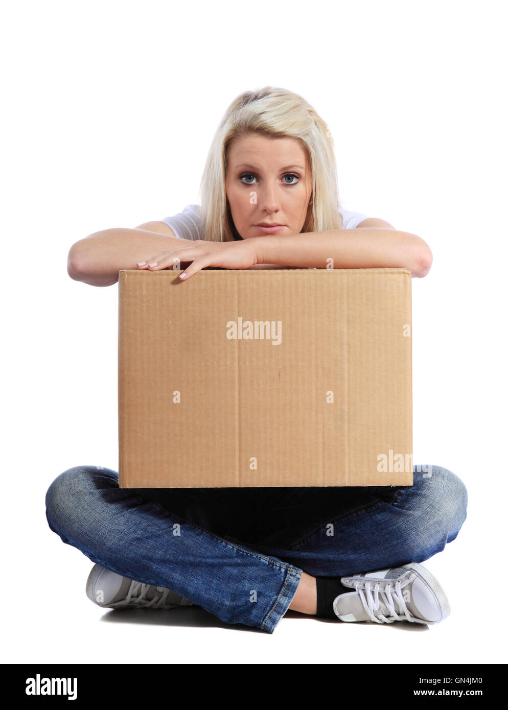 Young woman holding moving box Stock Photo - Alamy