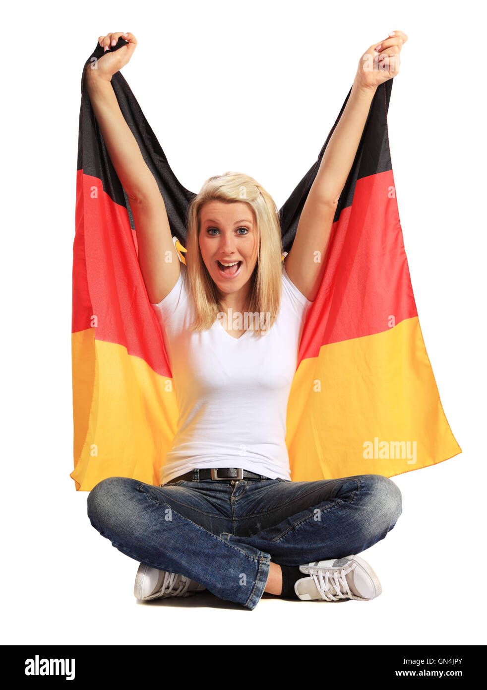 Attractive young woman cheering Stock Photo - Alamy