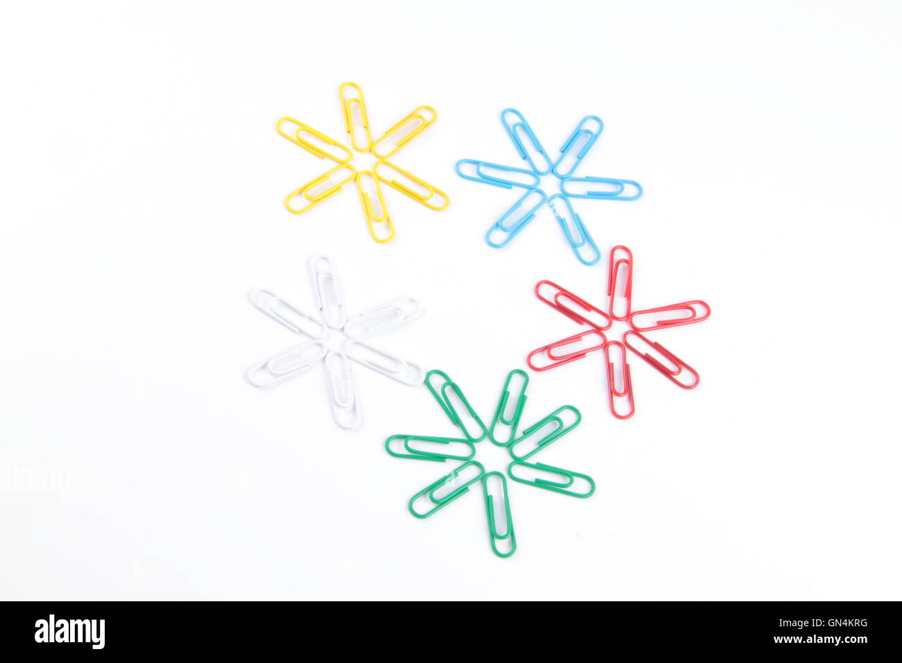 Office - Colored staples isolated on white Stock Photo - Alamy