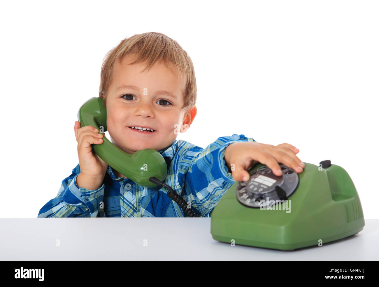 Cute caucasian boy using telephone all on white background hi-res stock ...