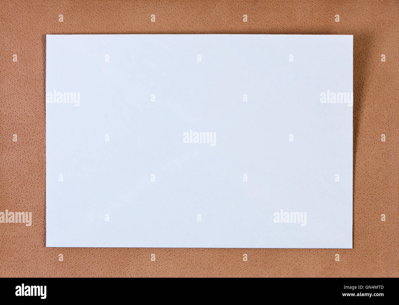 Blank sheet on leather background Stock Photo - Alamy