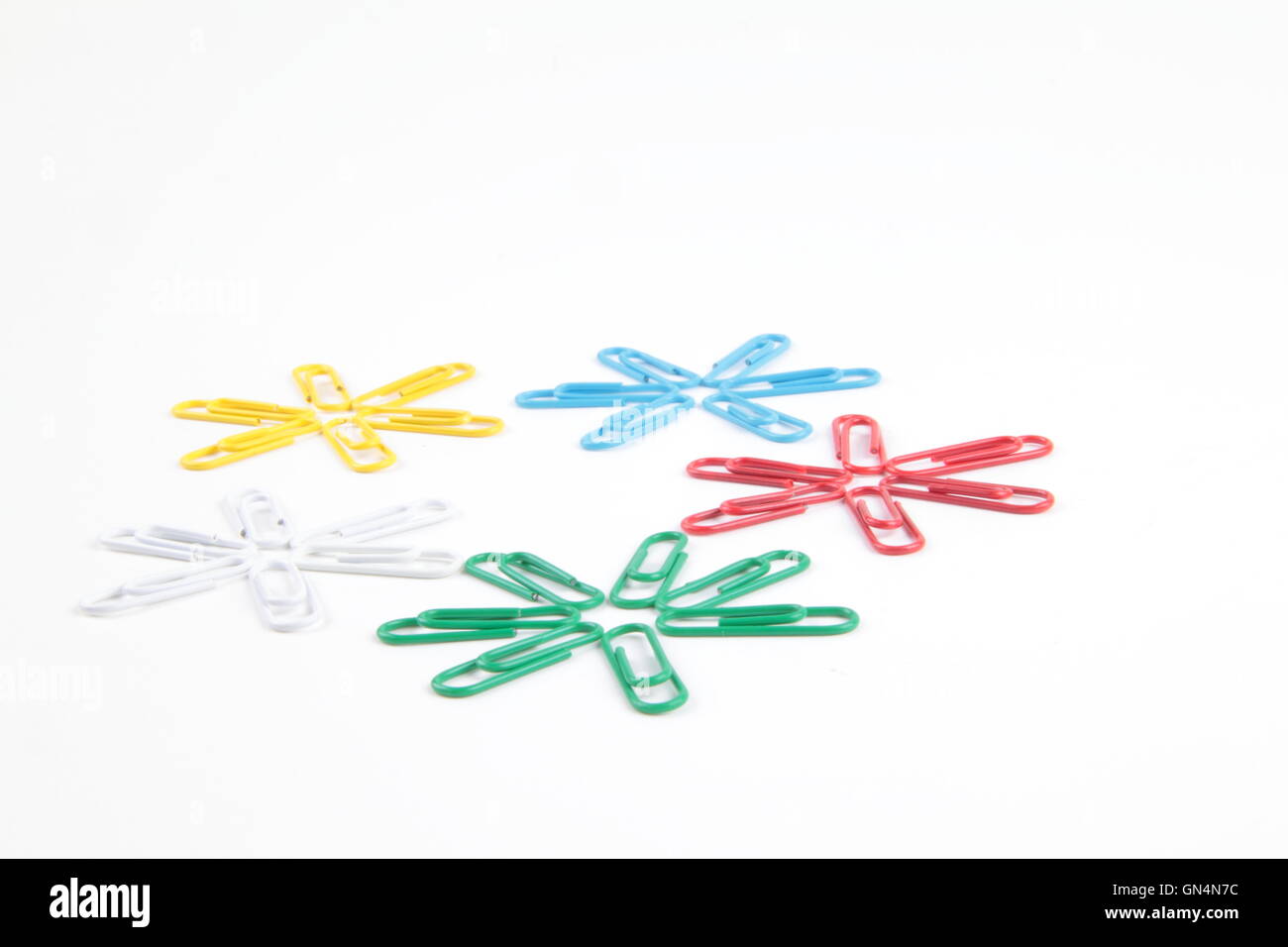 Office - Colored staples isolated Stock Photo - Alamy