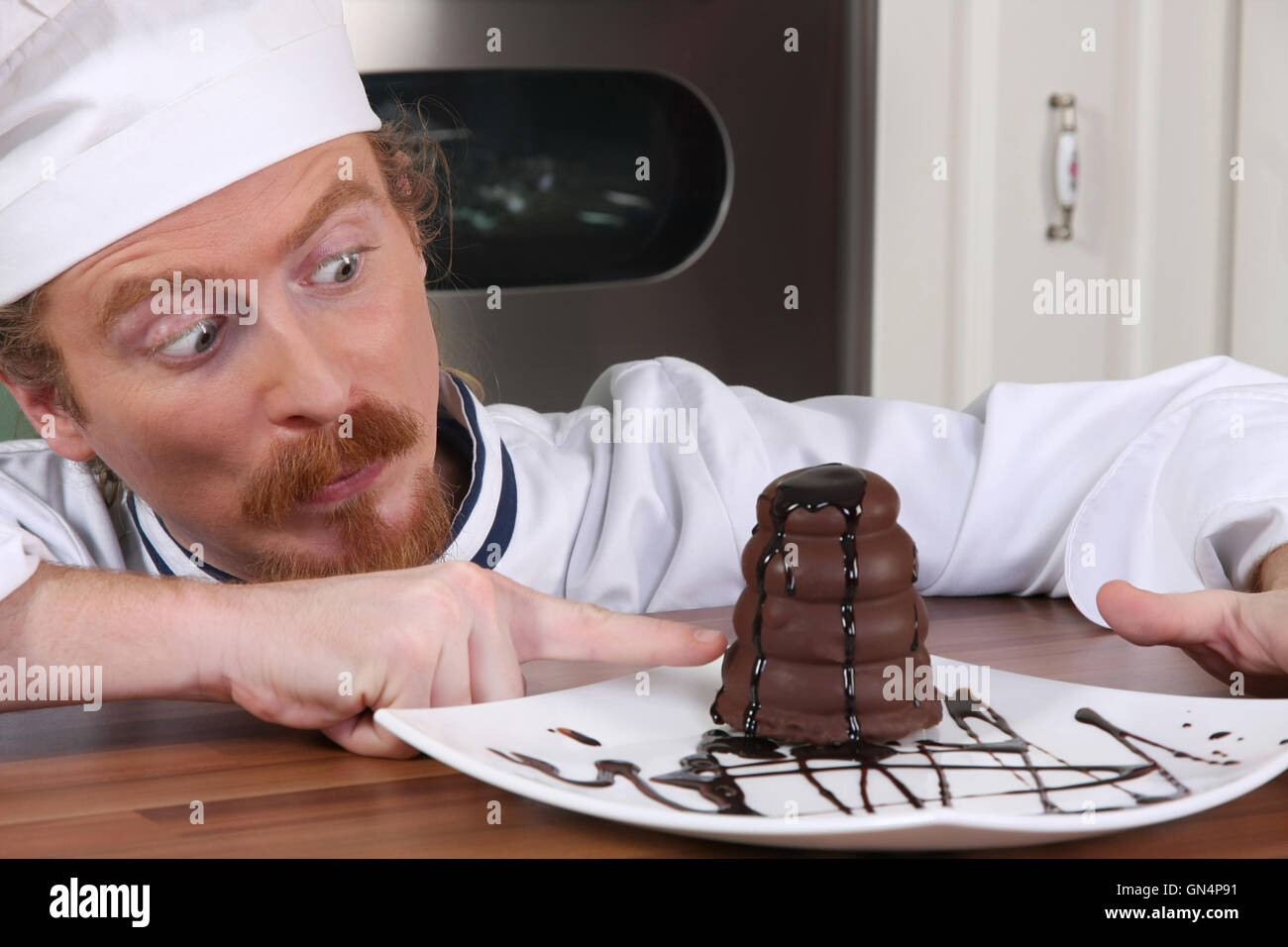 Funny young chef Stock Photo - Alamy
