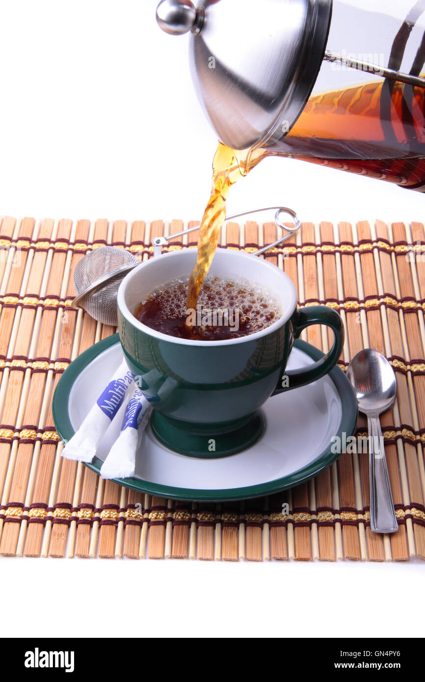 Pouring fresh tea Stock Photo - Alamy