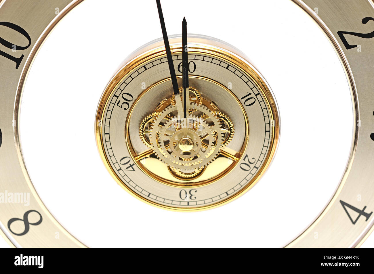 closeup golden clock with gears Stock Photo - Alamy