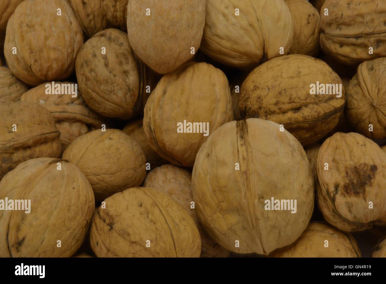 The Greek nuts background Stock Photo - Alamy