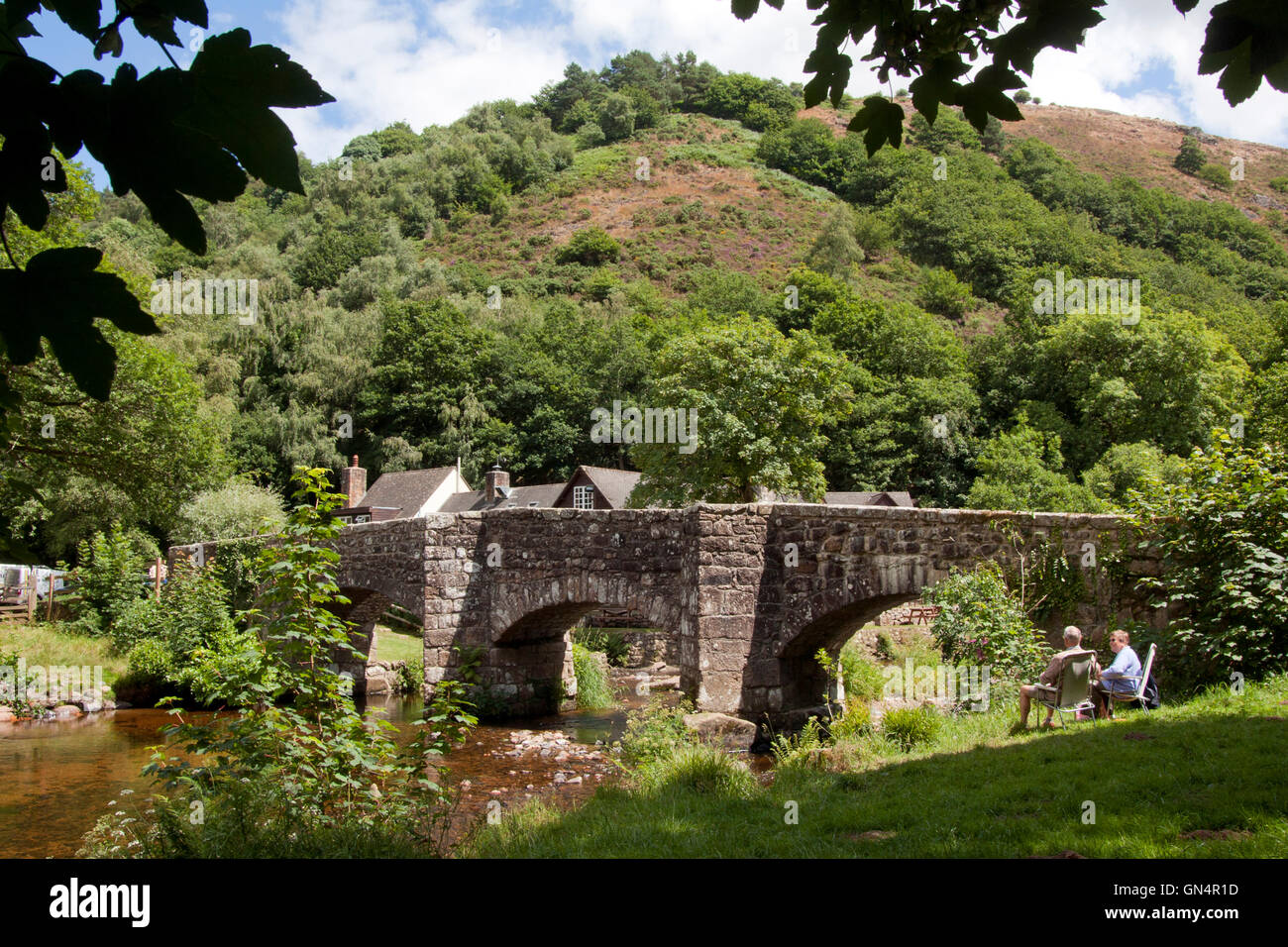 Fingle Bridge, a 17th-century stone arch bridge over the River Teign ...