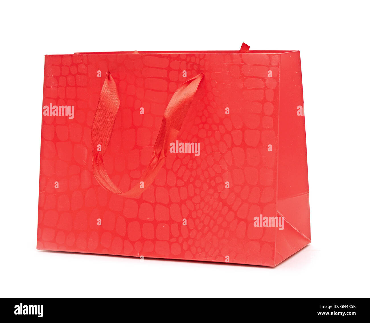The red package for purchases is isolated on a white background Stock ...