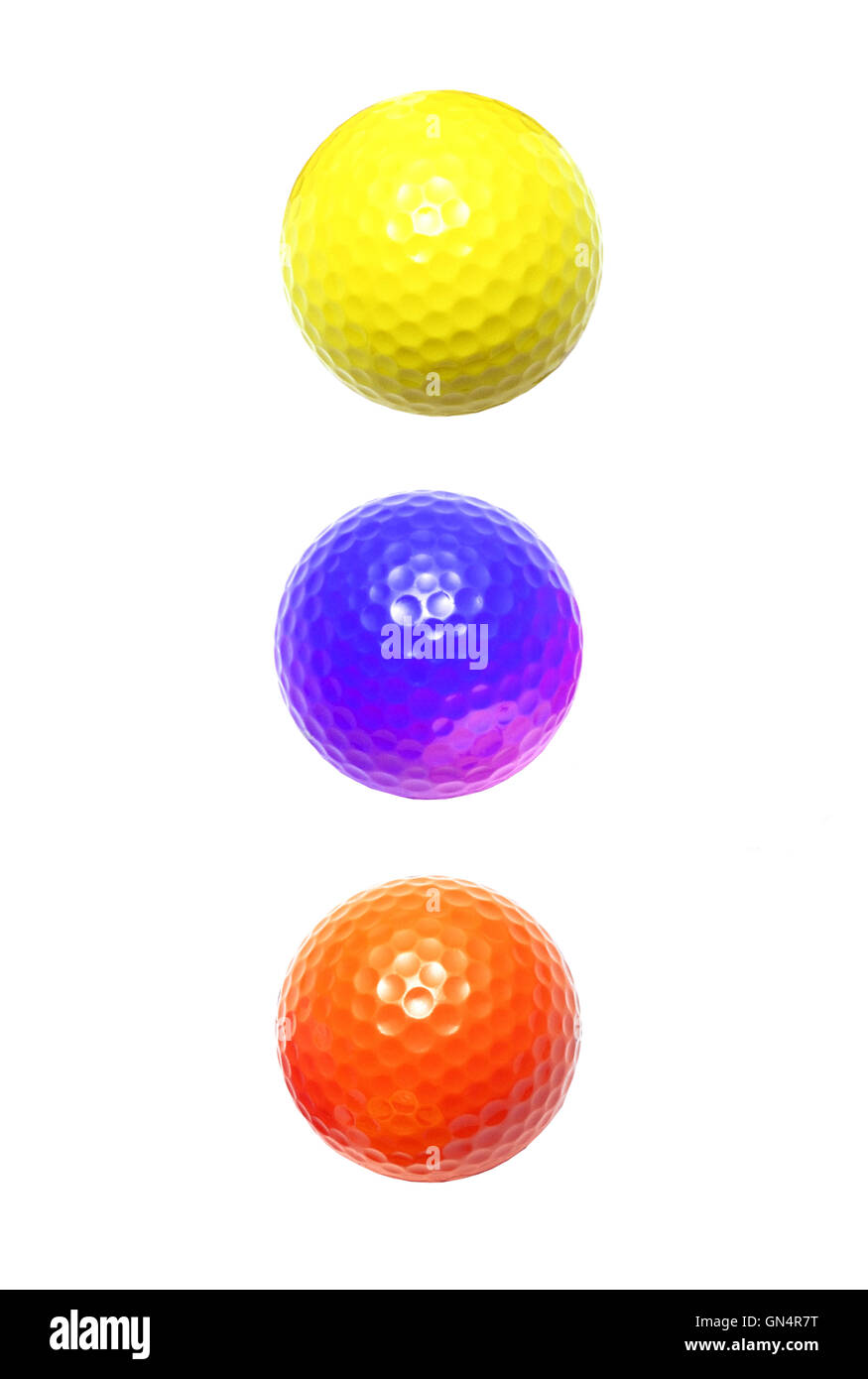 three colour golf balls Stock Photo - Alamy
