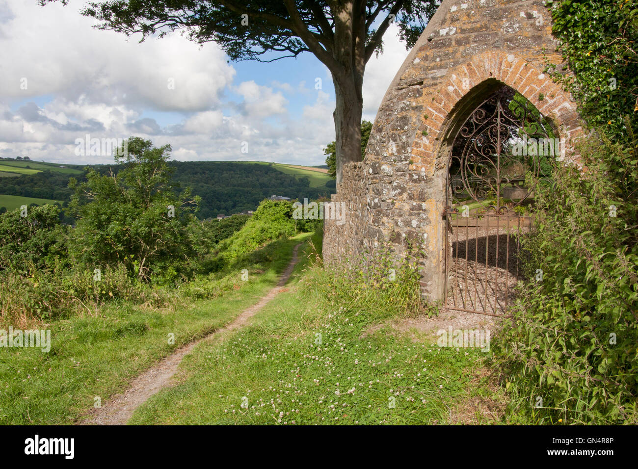 rural Devon landscape of the leper fields with castle gate in the ...