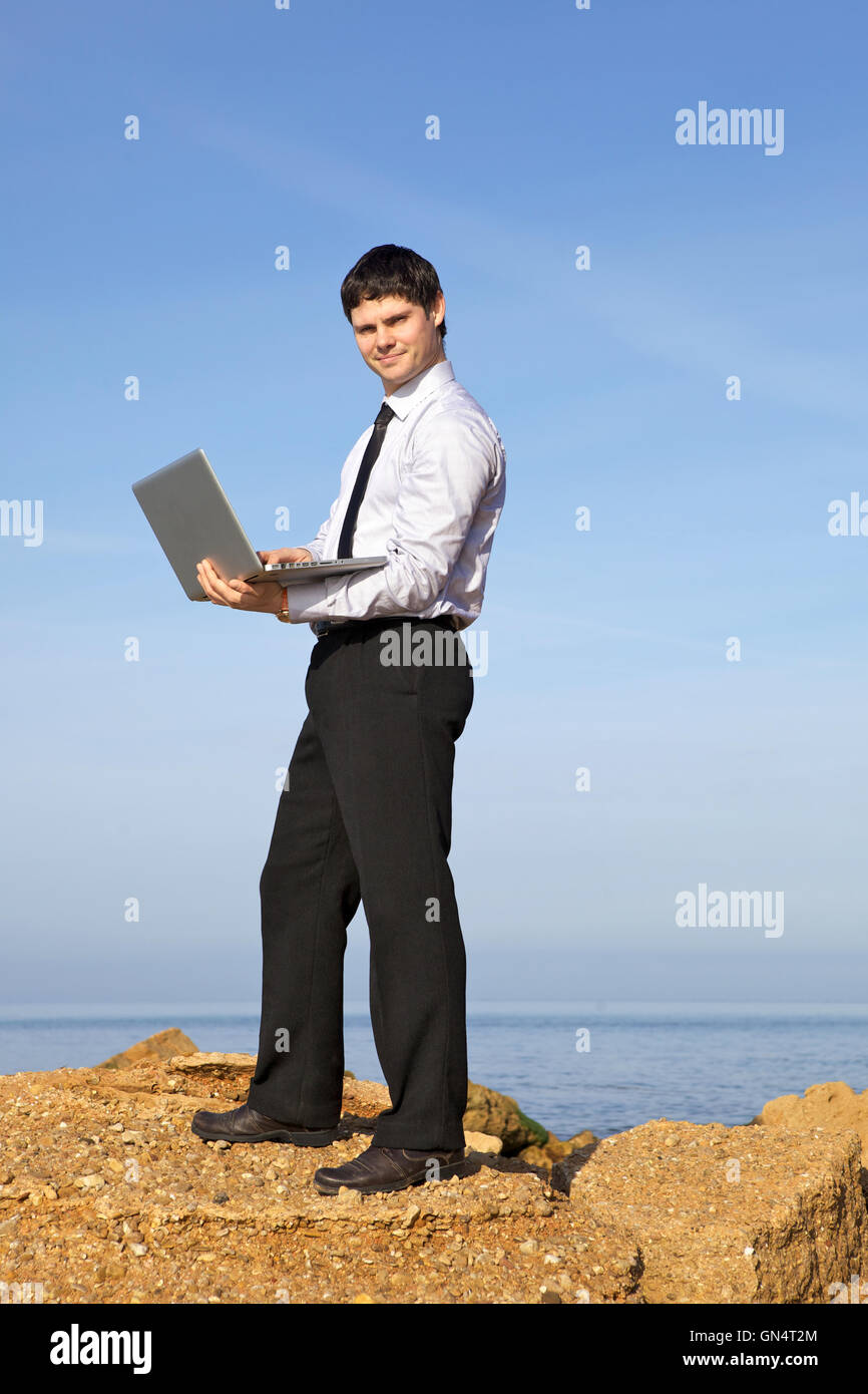 Man with laptop Stock Photo - Alamy