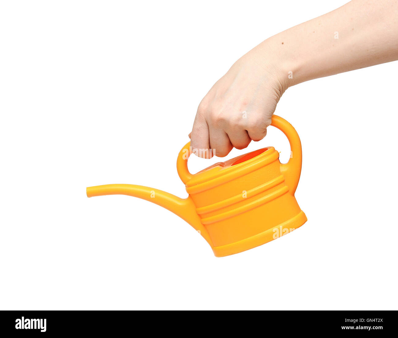 hand holding watering can isolated Stock Photo - Alamy