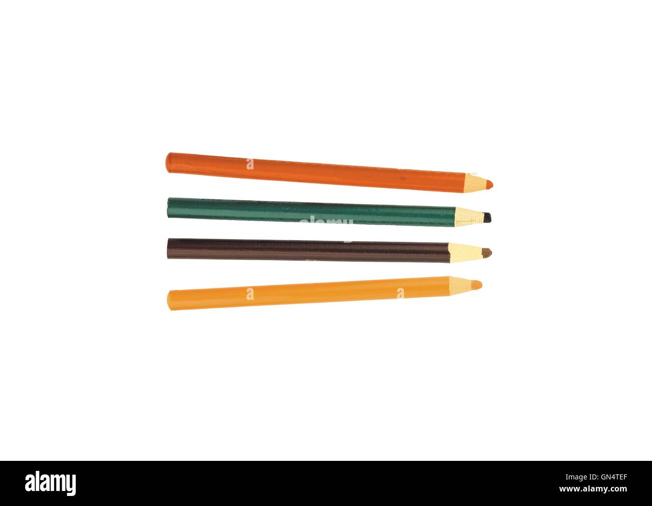 four colored pencils across white Stock Photo - Alamy