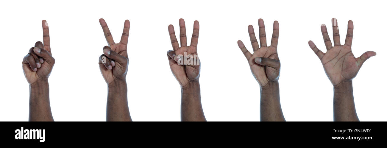 Dark-skinned hand counting Stock Photo - Alamy