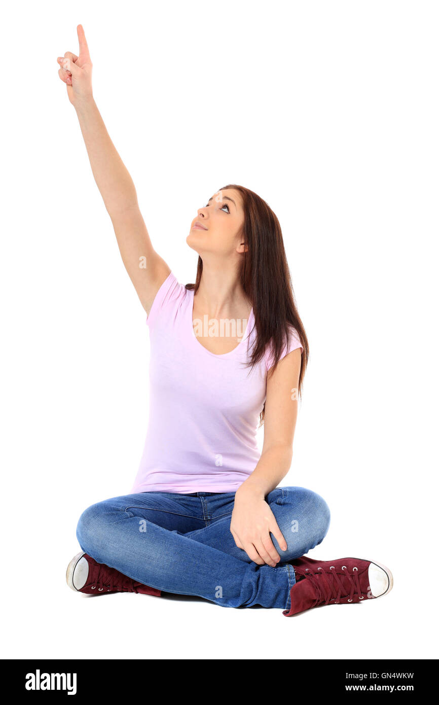 Woman sitting on the floor Stock Photo - Alamy