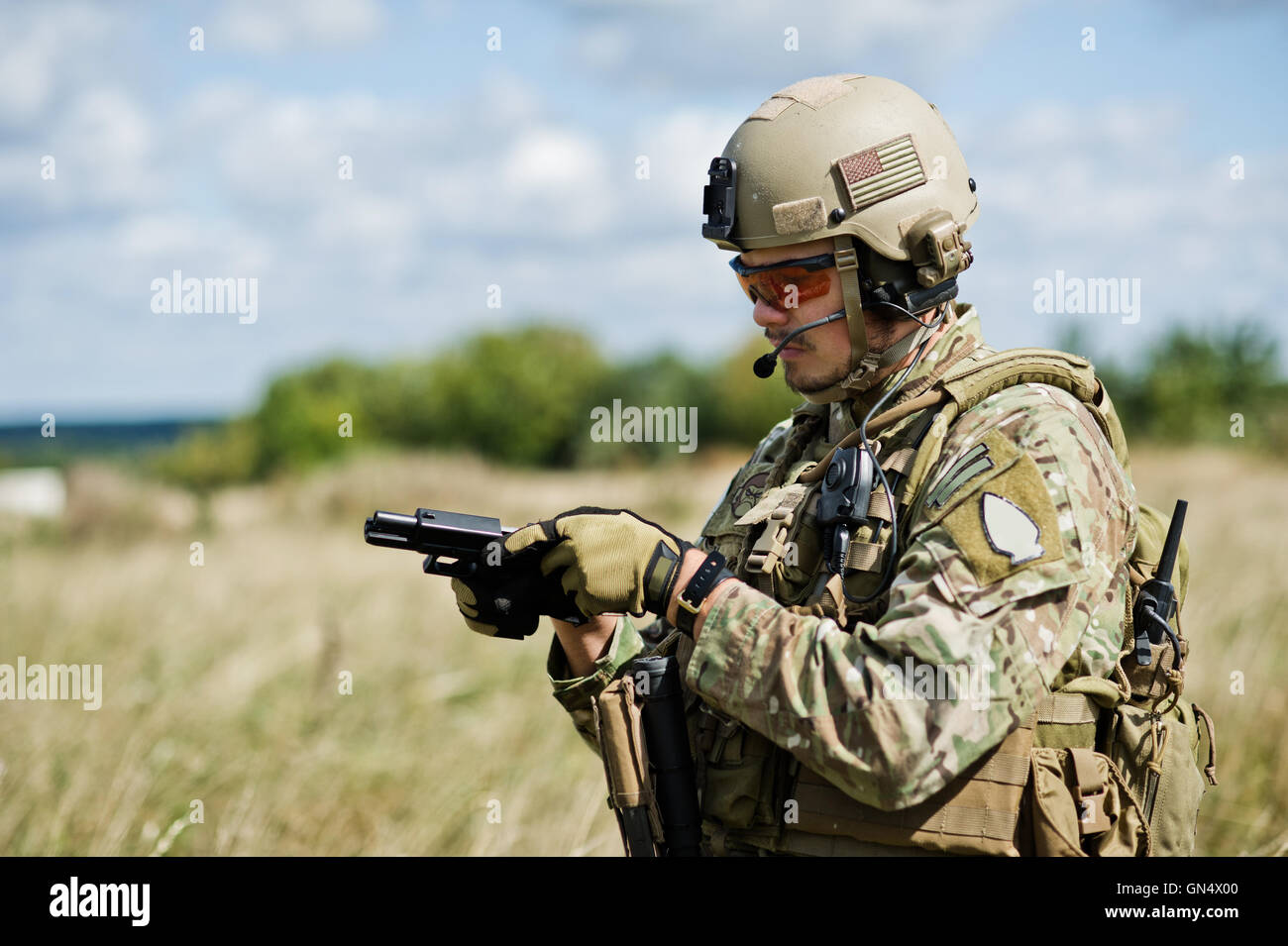 A soldier with a gun Stock Photo - Alamy