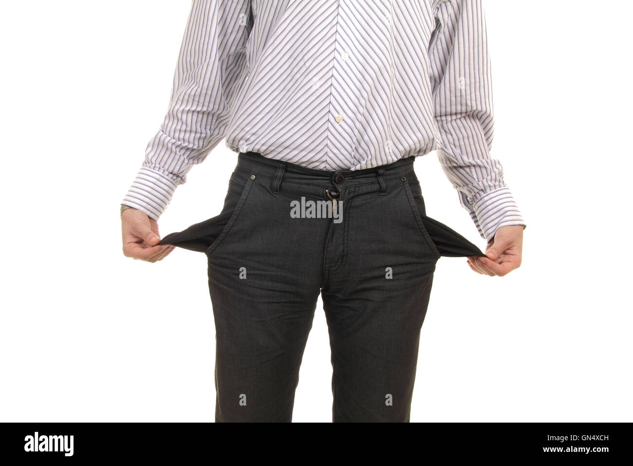 businessman showing the pocket of his pants empty Stock Photo - Alamy