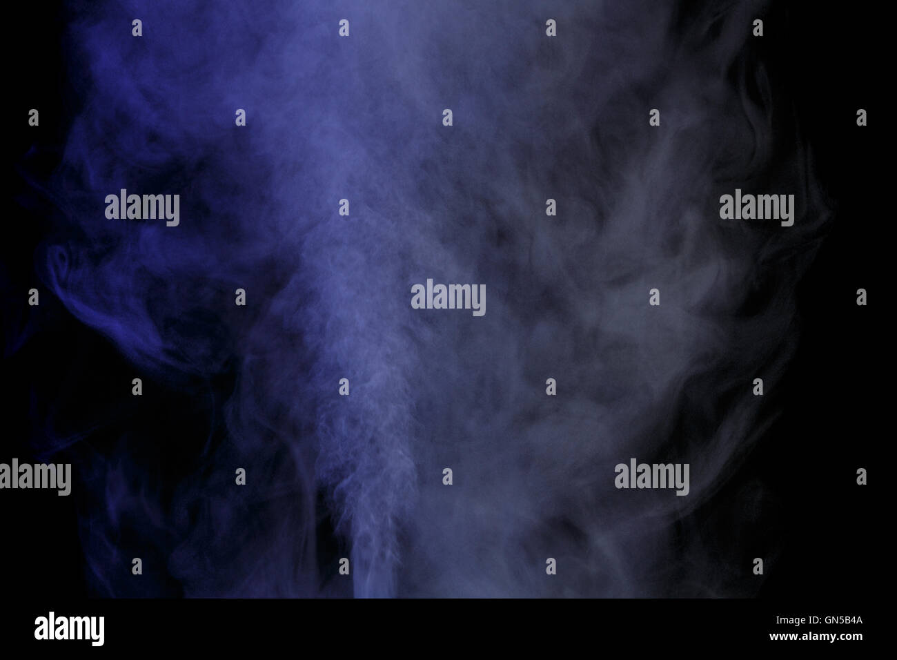 Abstract blue water vapor on a black background. Texture. Design ...