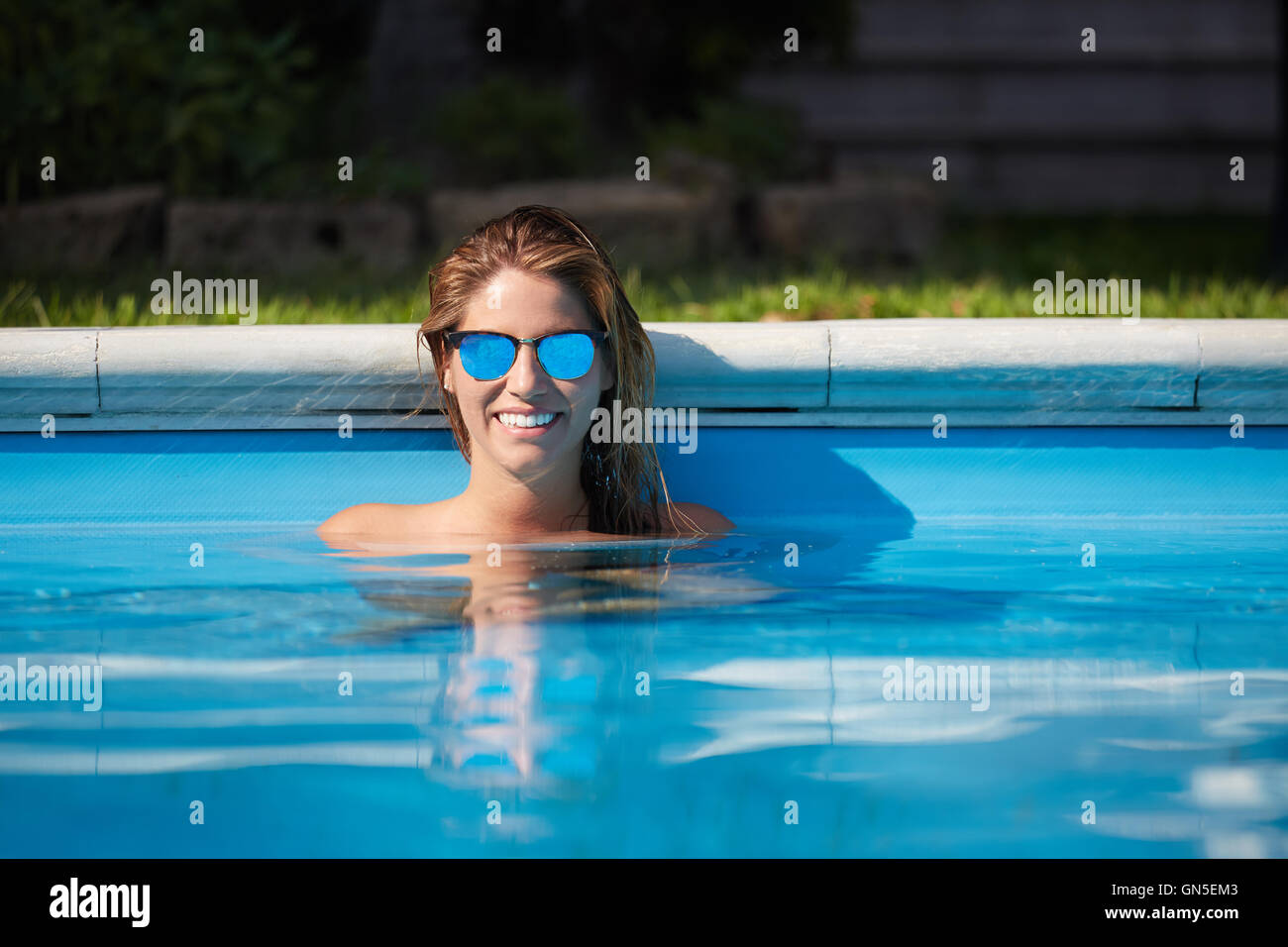 beautiful woman in swimming pool Stock Photo - Alamy