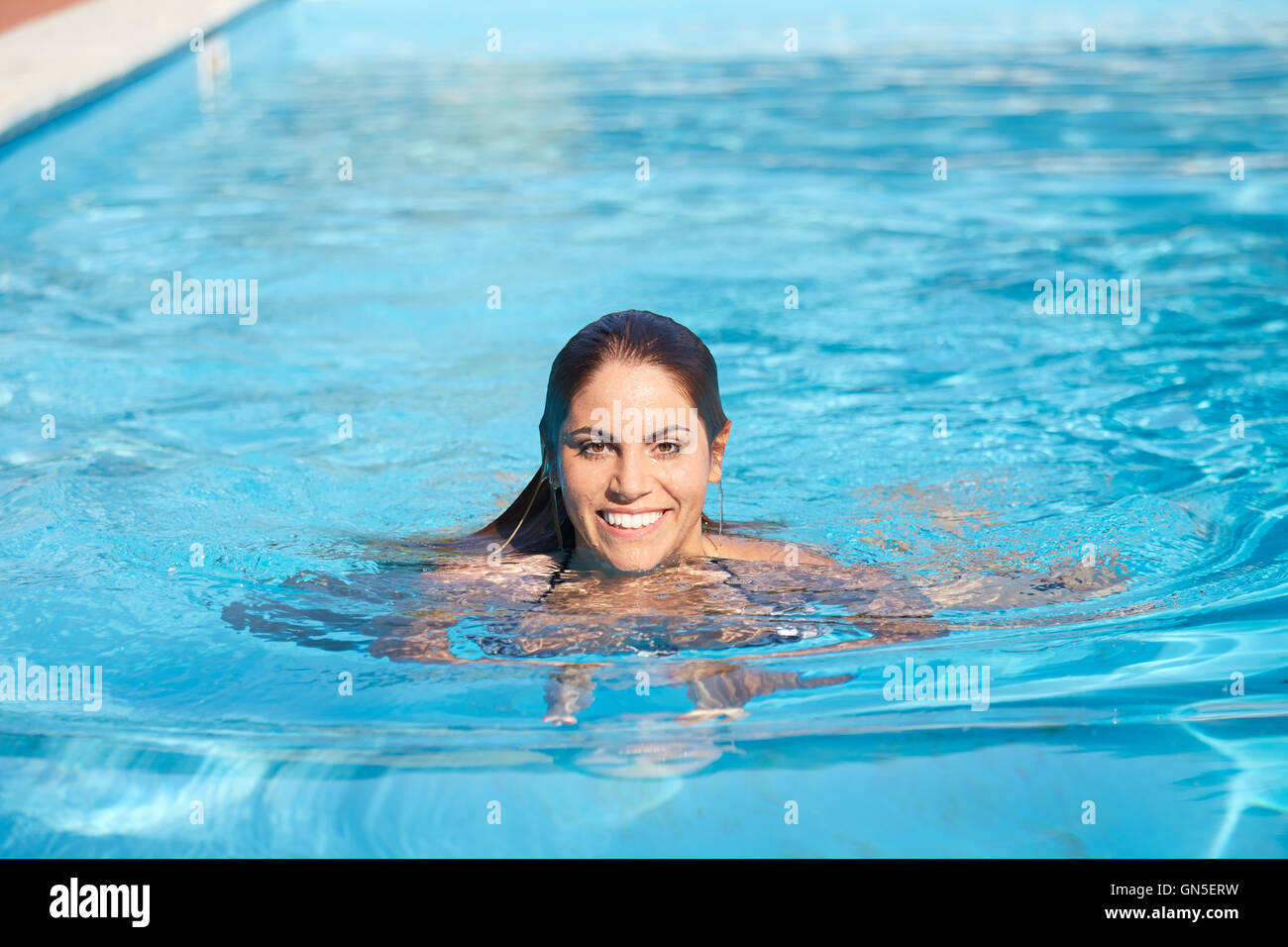beautiful woman in swimming pool Stock Photo - Alamy