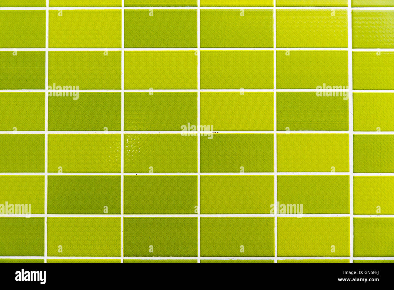 A green tiled background with relatively small tiles Stock Photo - Alamy