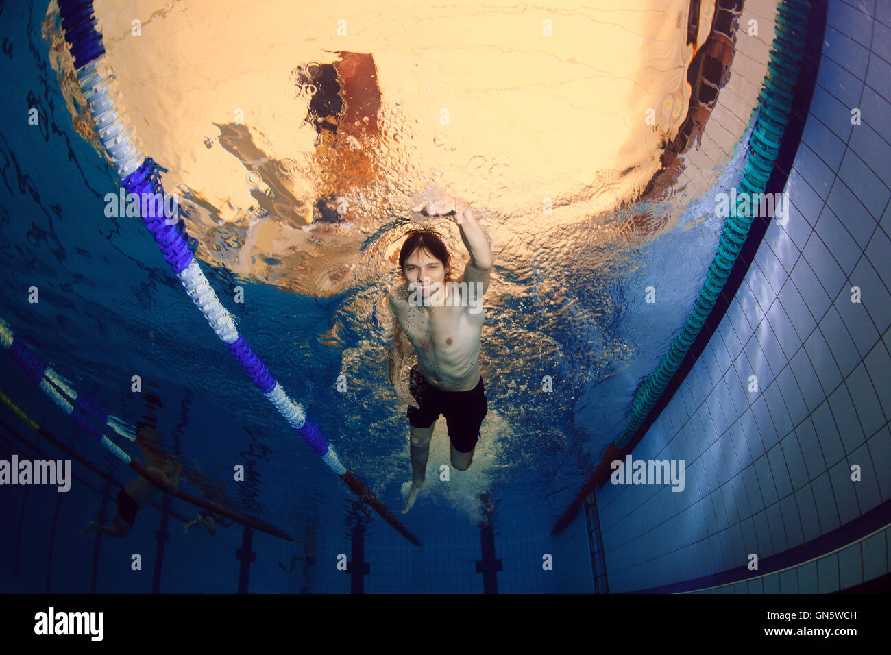 man in swimming pool Stock Photo - Alamy