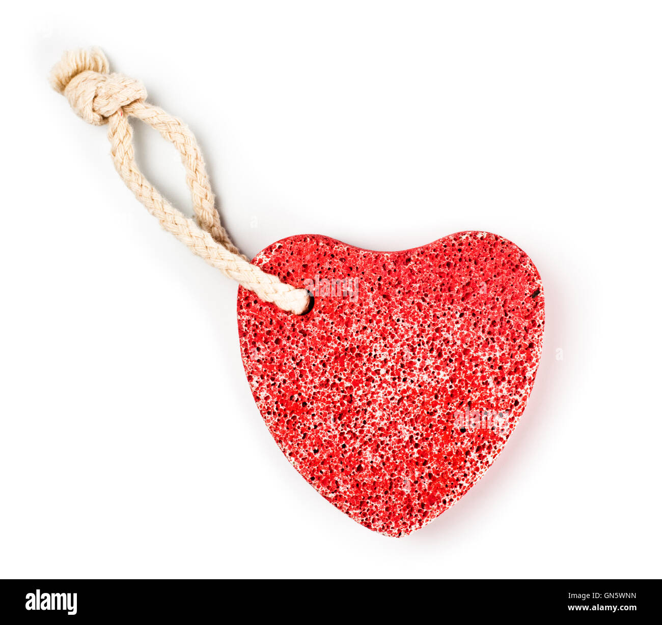 red heart-shaped stone with rope Stock Photo - Alamy