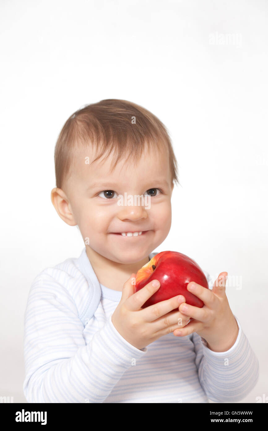 baby with red apple Stock Photo - Alamy