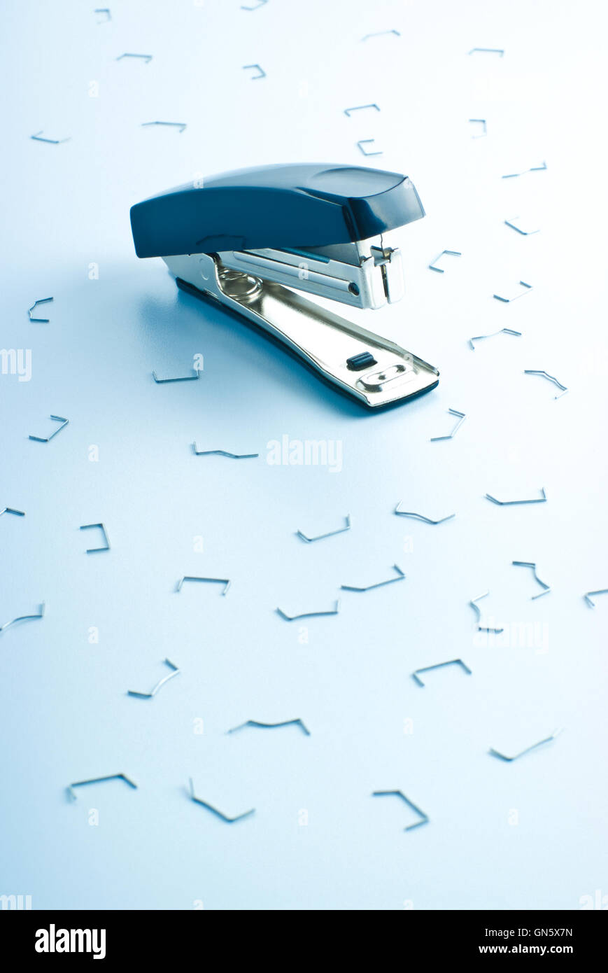 office stapler and many clips Stock Photo - Alamy