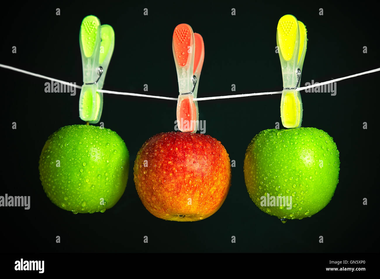 Concept food idea apples black hi-res stock photography and images - Alamy