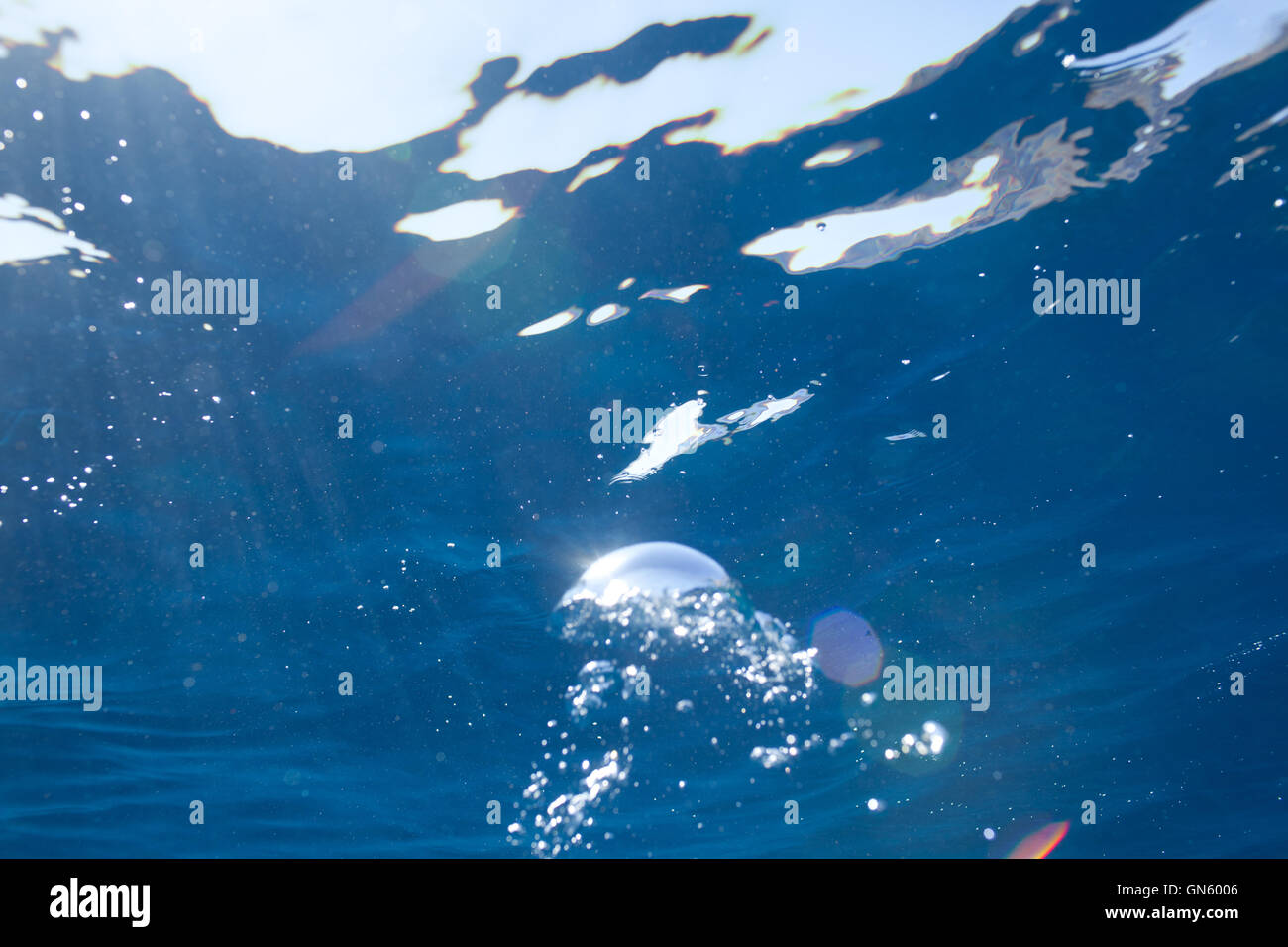 background of sunlight bubbles in water Stock Photo - Alamy