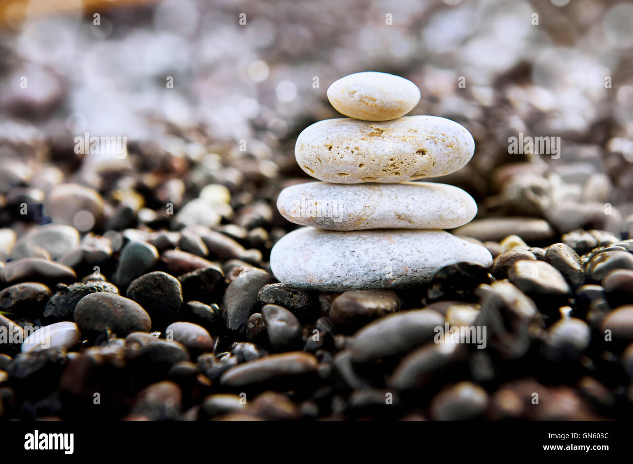 Stones pyramid on the beach. Zen and harmony concept Stock Photo - Alamy