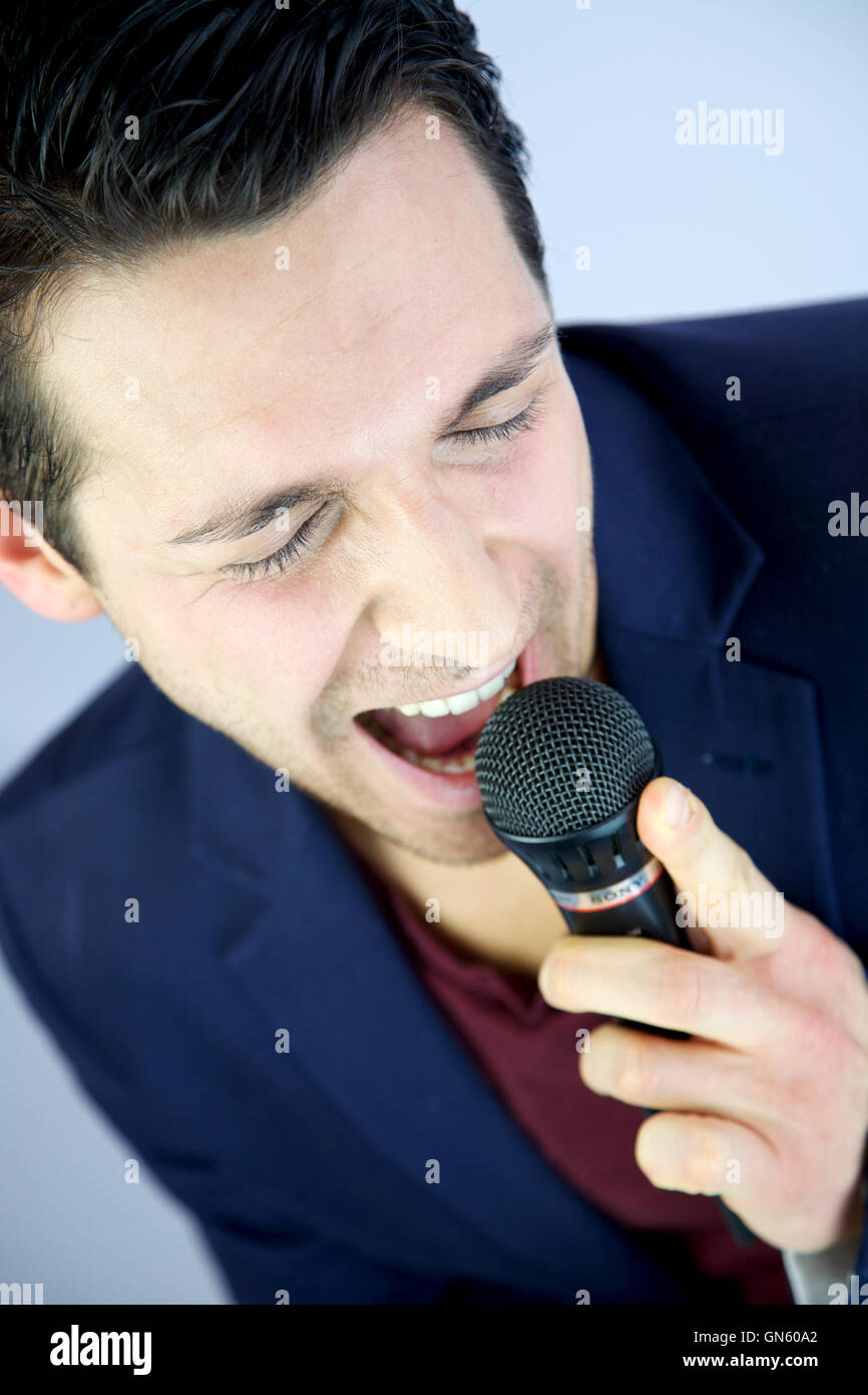 Man singing with passion Stock Photo - Alamy