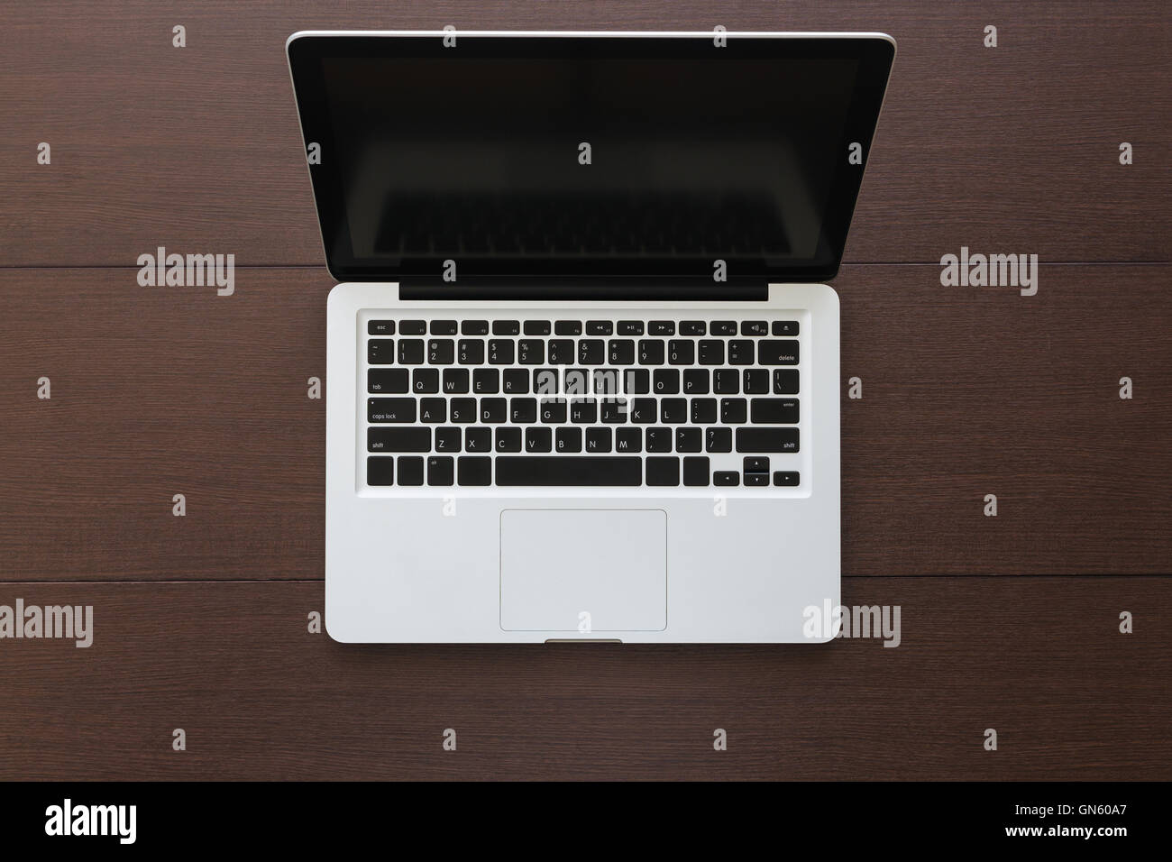 laptop computer on wood desk top view Stock Photo - Alamy