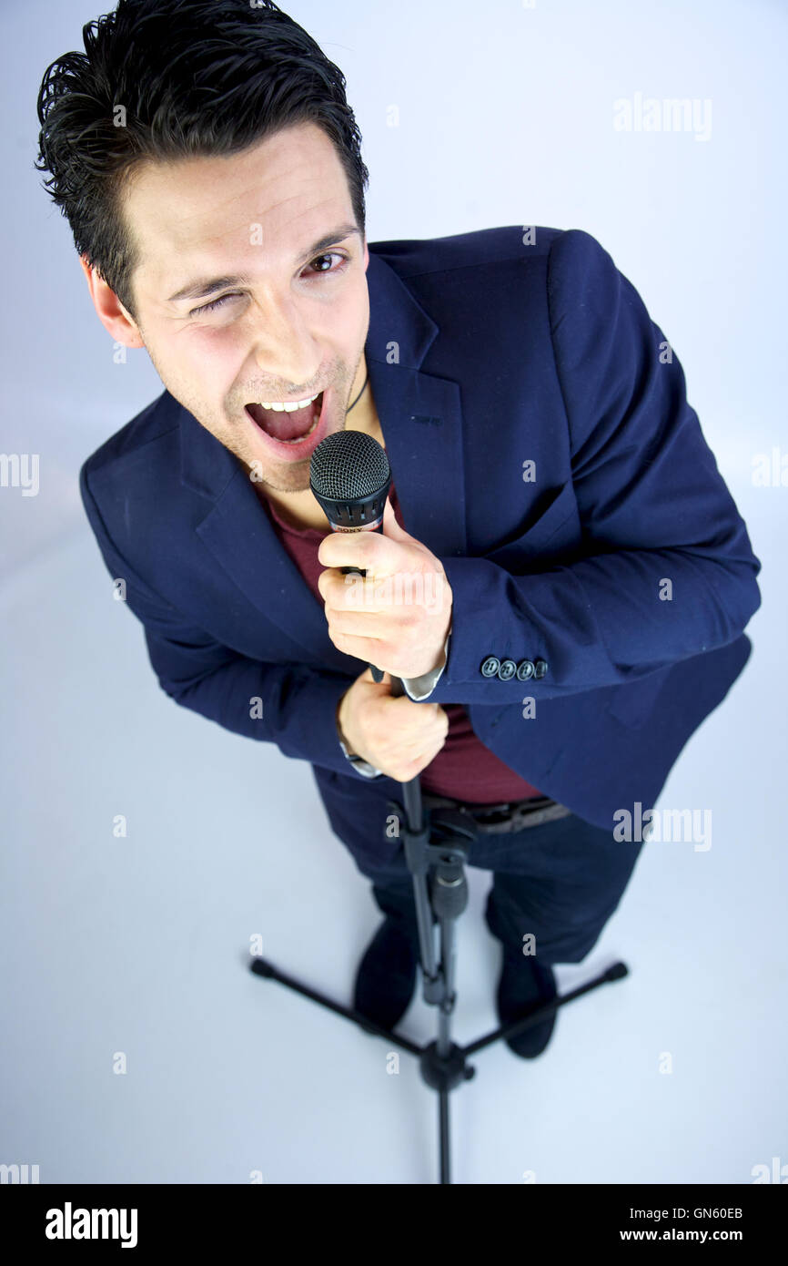 Singer winking eye Stock Photo - Alamy