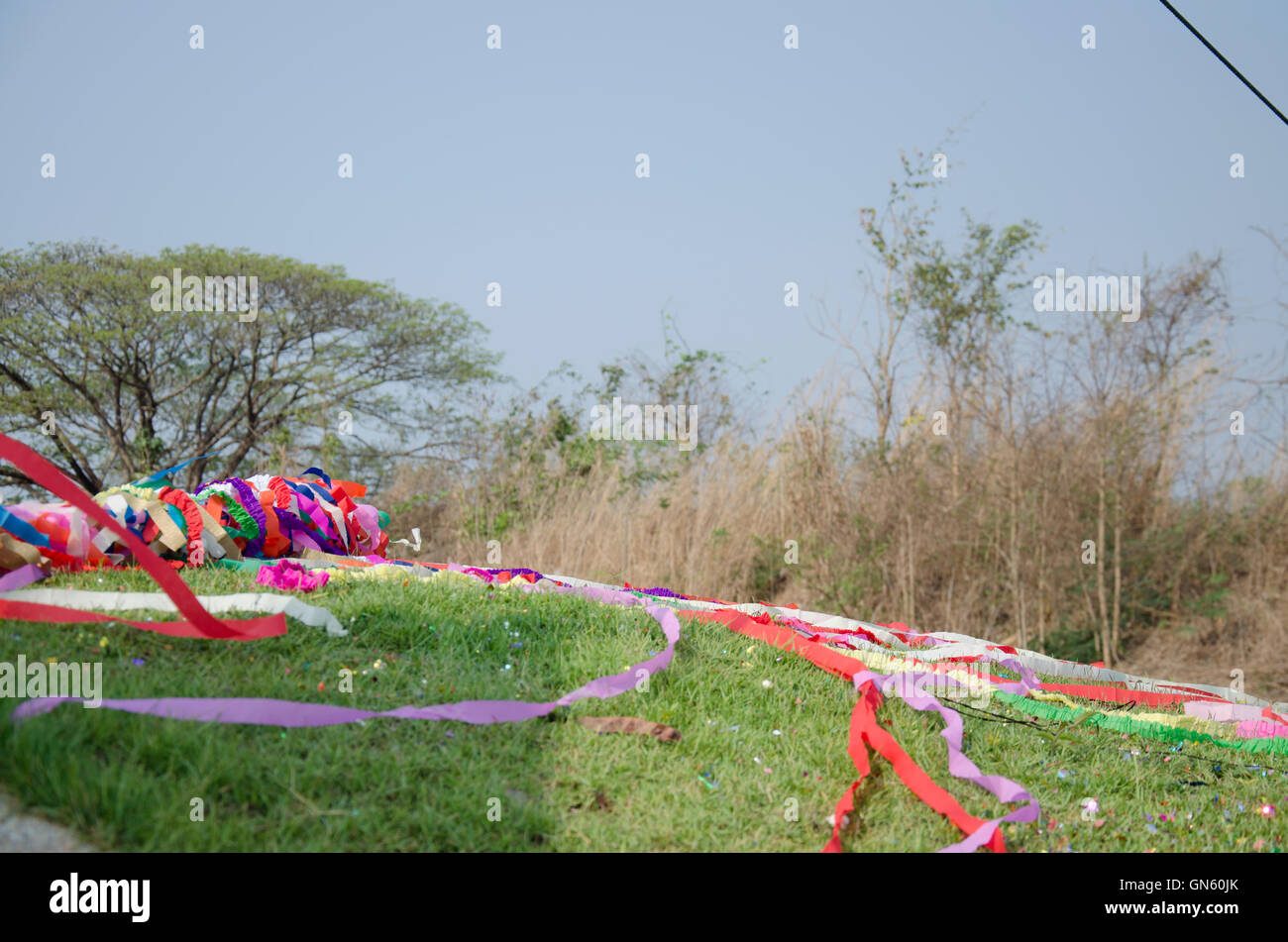 Chinese tradition and culture process colored paper put on a grave of ...