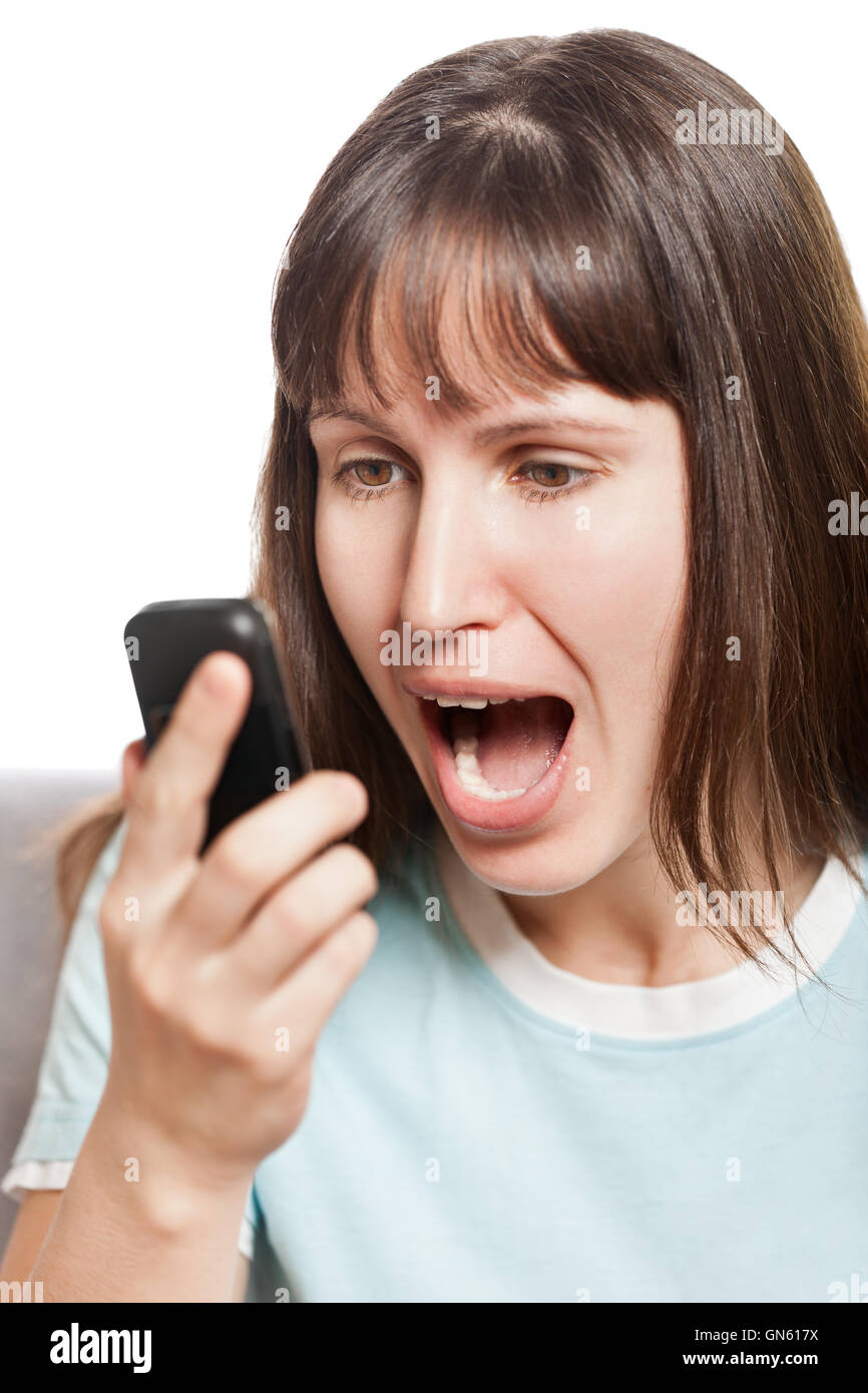 Angry woman talking mobile phone Stock Photo - Alamy