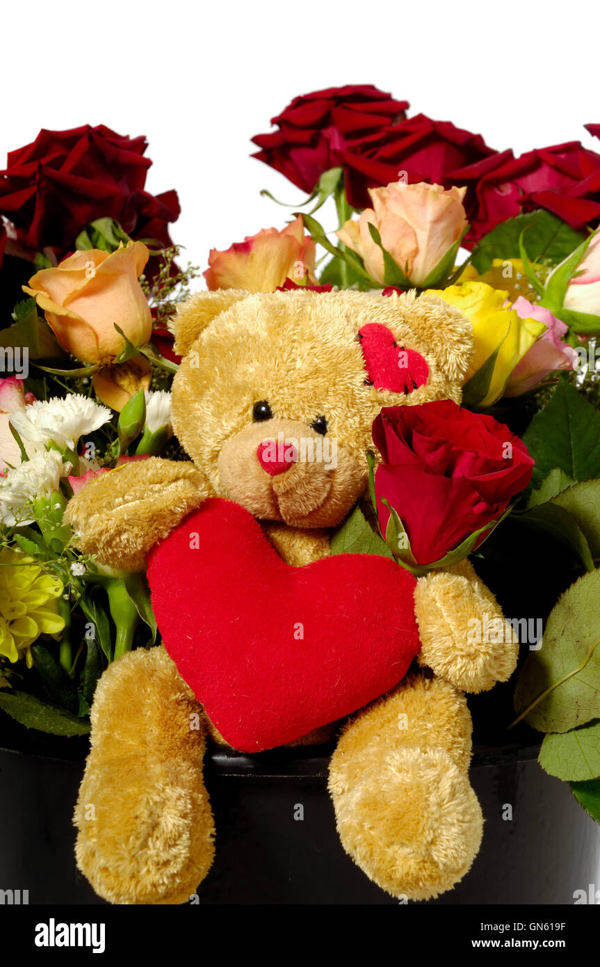 Teddy bear and roses Stock Photo - Alamy