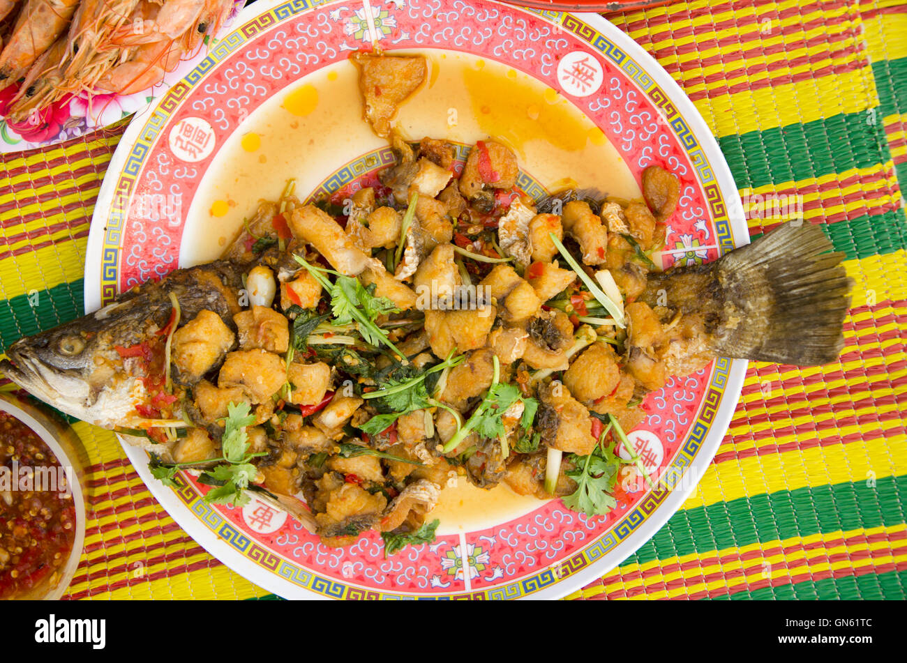 Deep Fried Snapper topped with Sweet Fish Sauce of Sacrificial offering ...